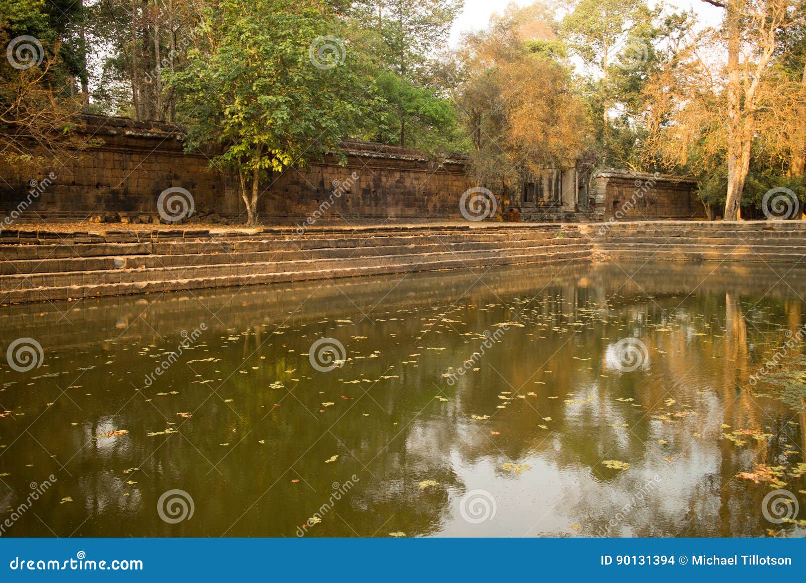 Ancient Water Pool by a Broken Temple Wall in Angkor Stock Photo ...