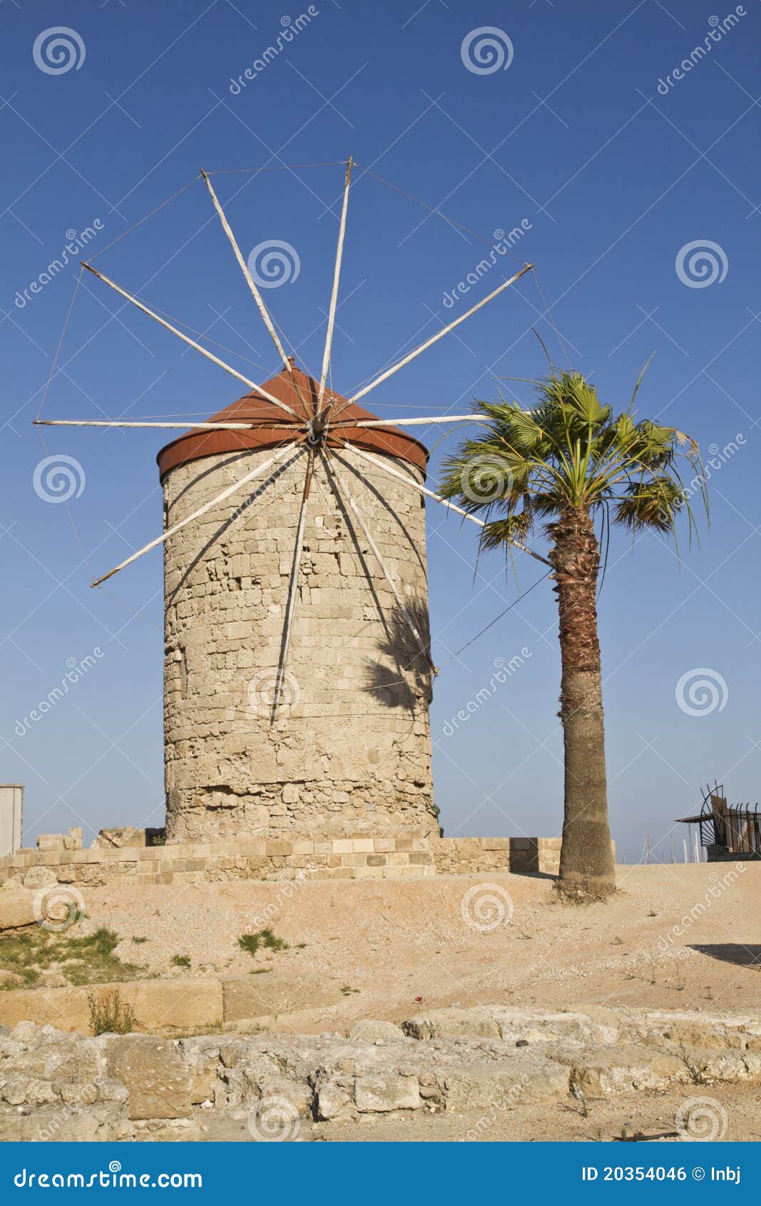 Ancient windmill in Rhodes stock photo. Image of empty - 20354046