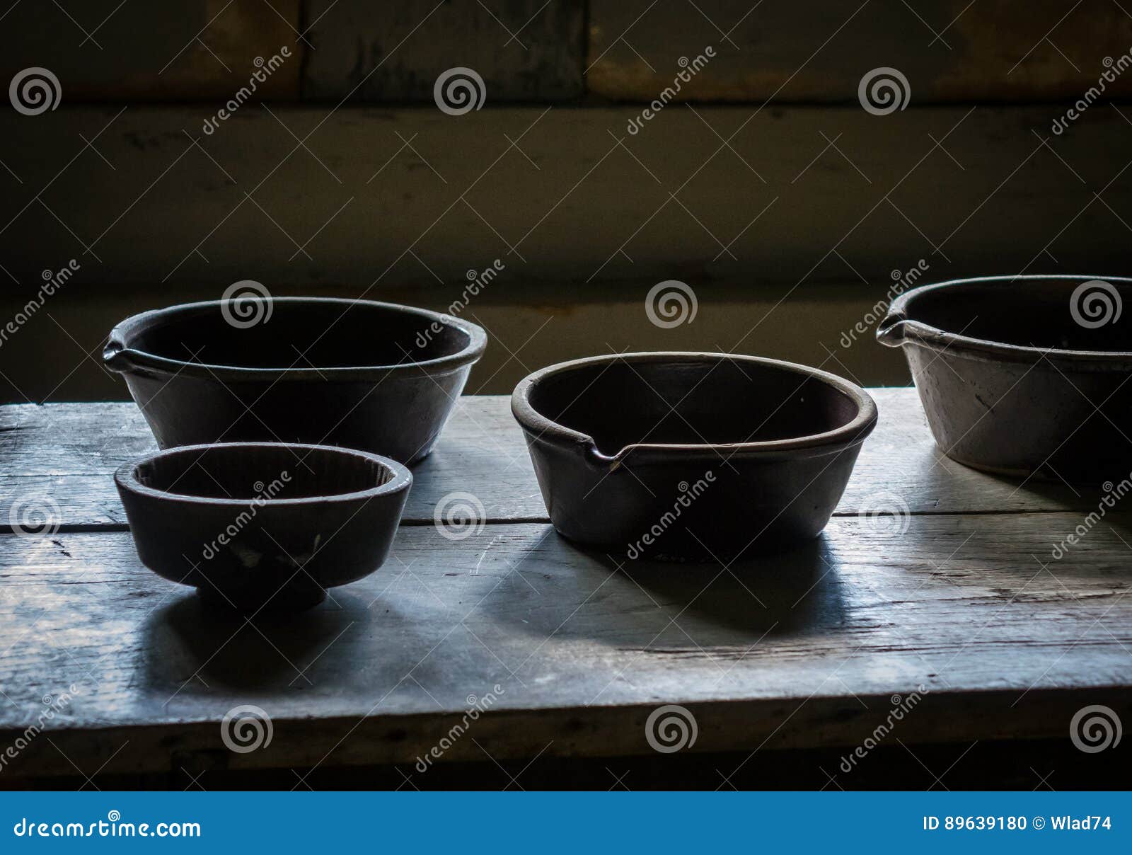 The Ancient Wooden Plates on a Table Stock Photo - Image of utensil ...