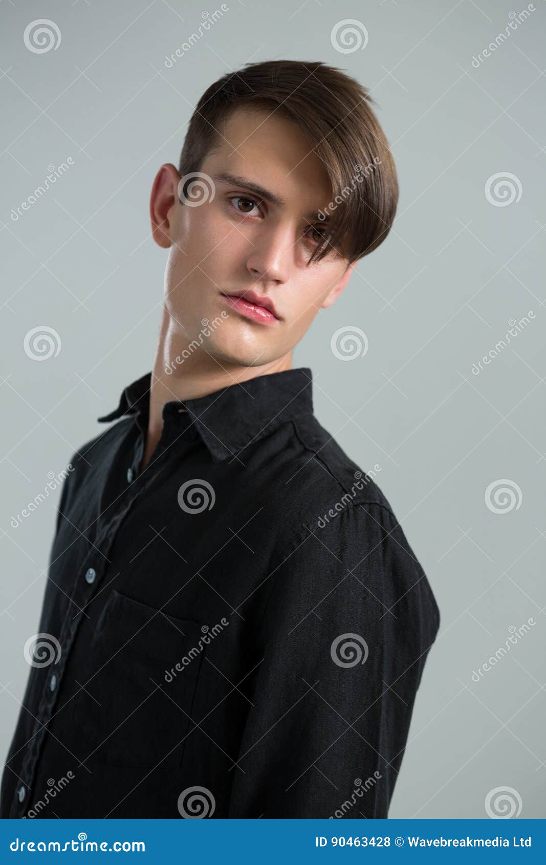 Androgynous Man Looking at Camera Stock Photo - Image of grey ...
