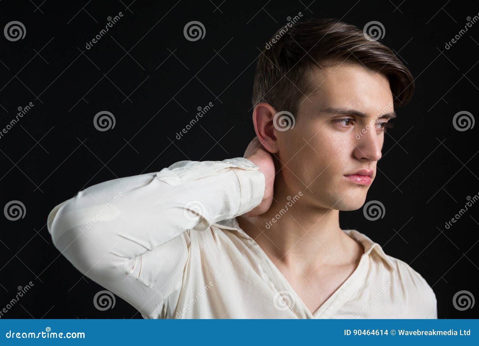 Androgynous Man Posing with Hand on His Neck Stock Photo - Image of ...
