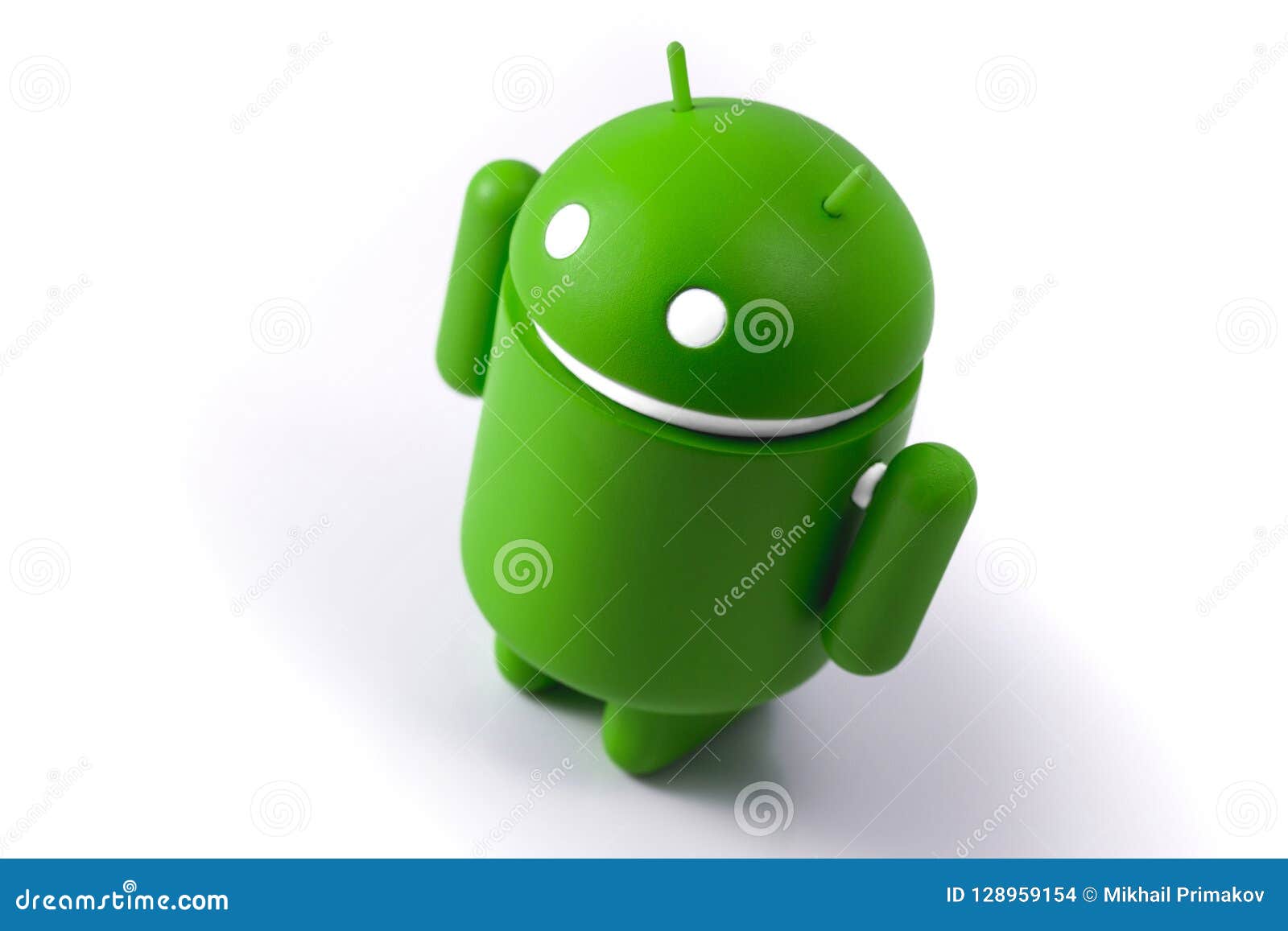 Android Replica Standing on White Table. Android is the Operating ...