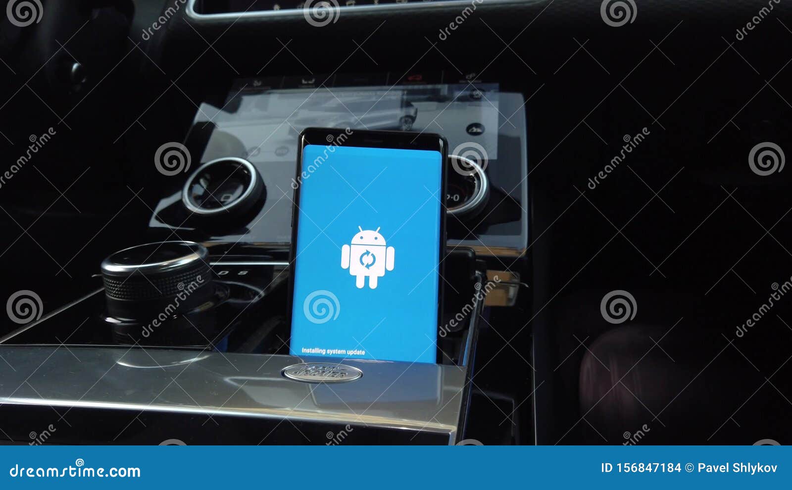 Android Robot Logo Icon on the Smart Phone Screen during Update ...