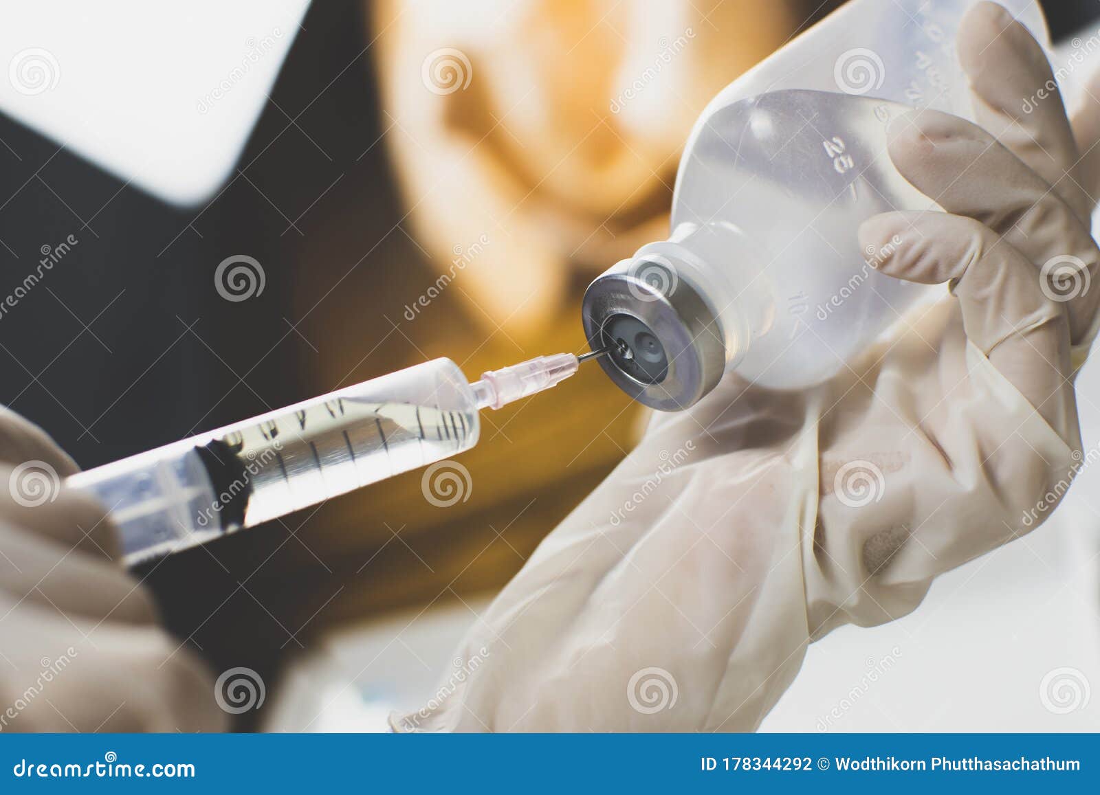 Anesthesiologist Doctors Hand Inject Syringe into Normal Saline ...