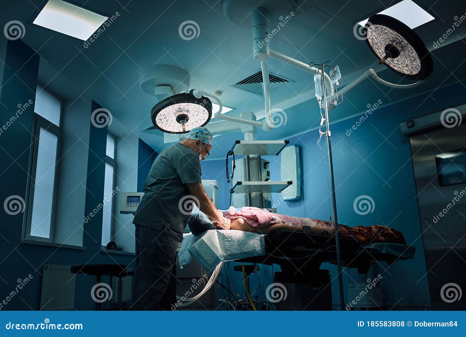 Anesthetist At A Operating Room Setting The Anesthesia Machine Royalty ...