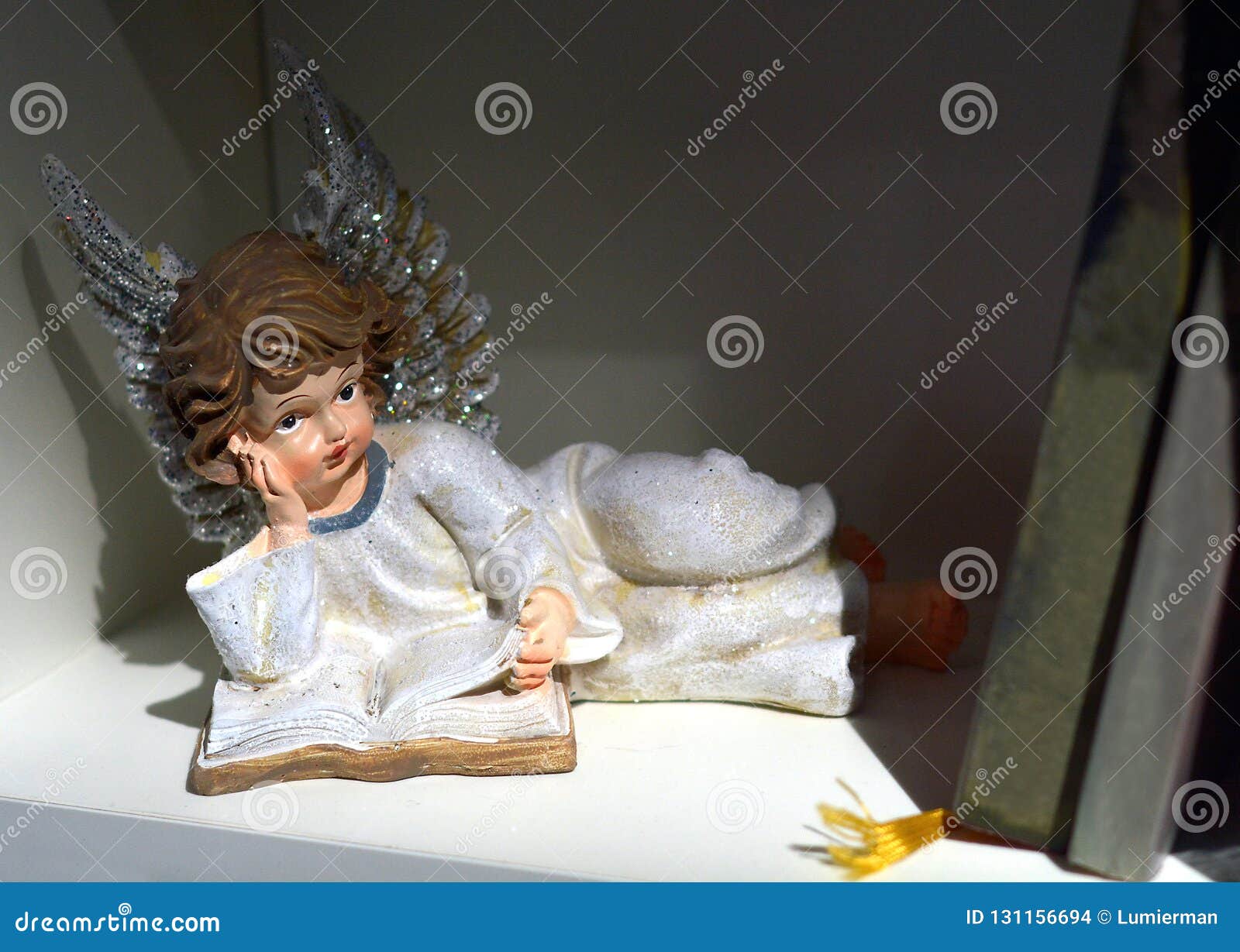 Angel with a book stock photo. Image of decorating, celebration - 131156694