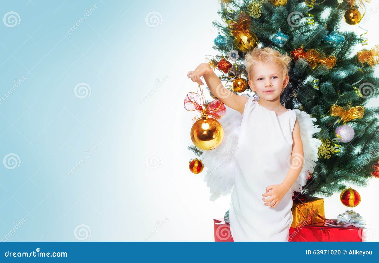 Angel Boy and Christmas Tree Stock Photo - Image of white, child: 63971020