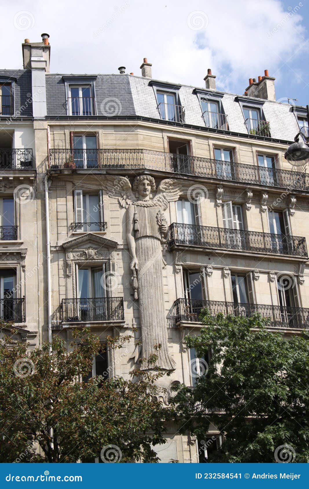 Angel on a building editorial photo. Image of larstatue - 232584541