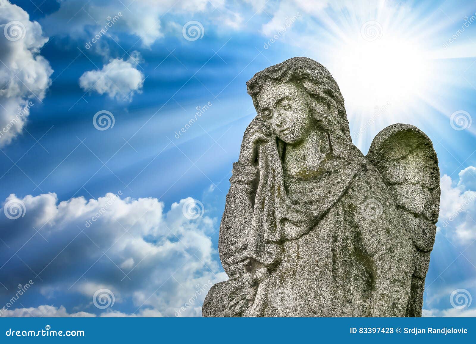 Angel. Crying Angel. Sunlight and Clouds Background Stock Photo - Image ...
