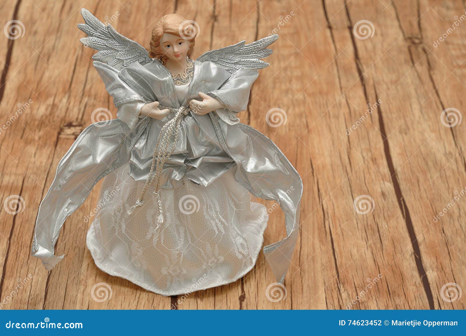 An angel dressed in silver stock photo. Image of celebration - 74623452