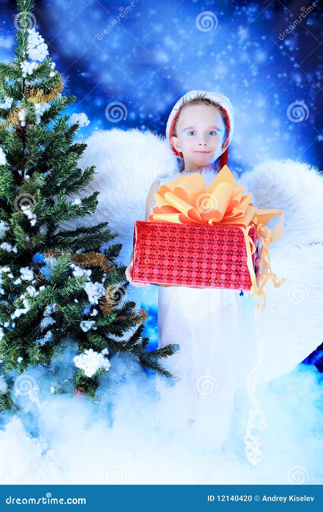 Angel with a gift stock photo. Image of beautiful, infant - 12140420