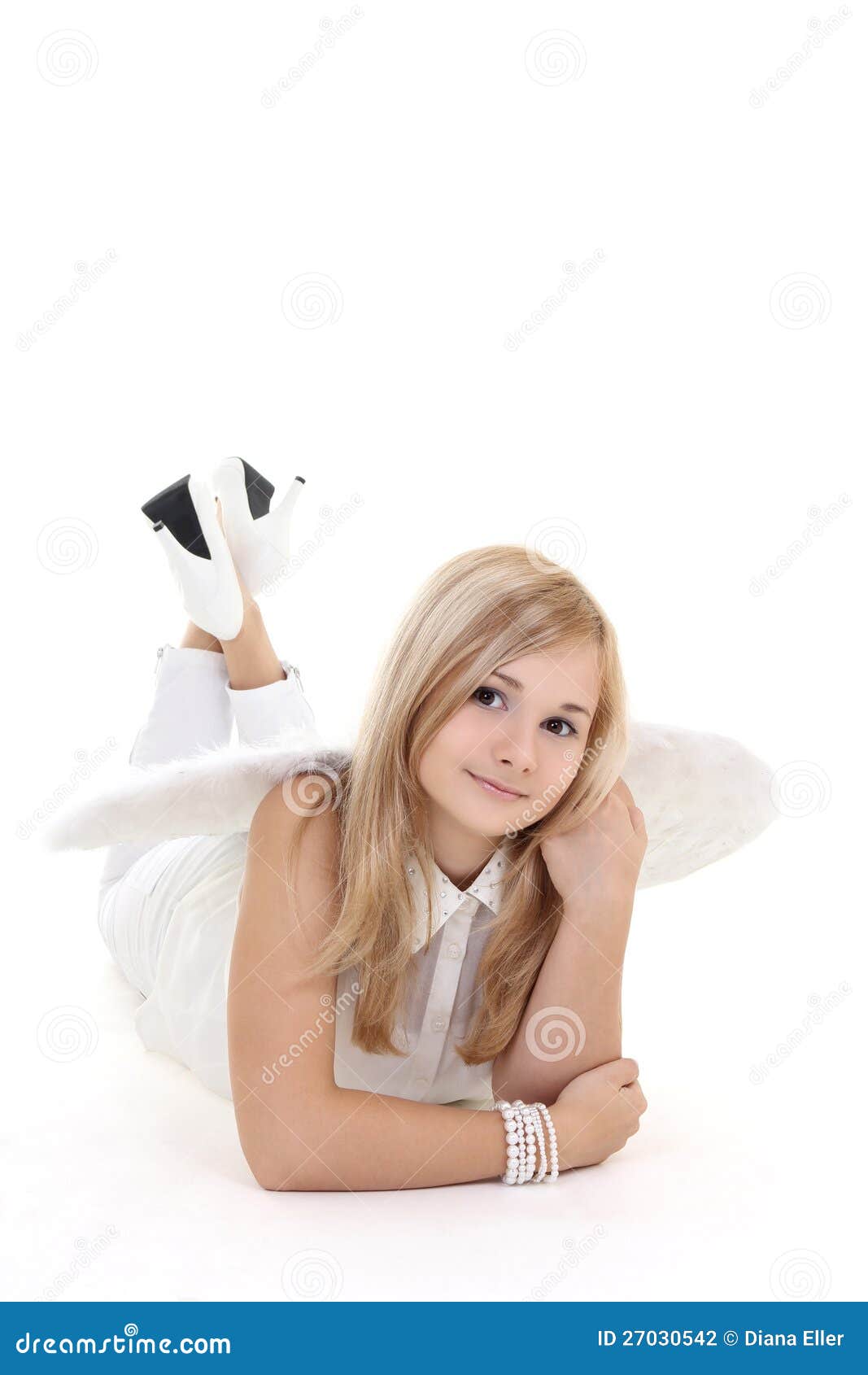 Angel girl in white lying stock photo. Image of attractive - 27030542