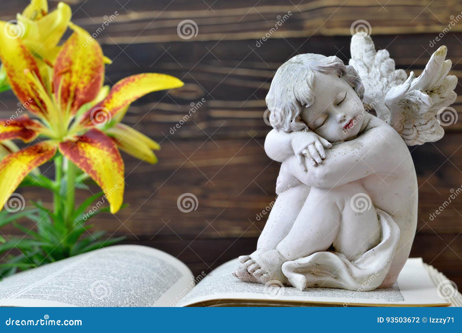 Angel Guardian and Lily Flower Stock Photo - Image of card, figurine ...