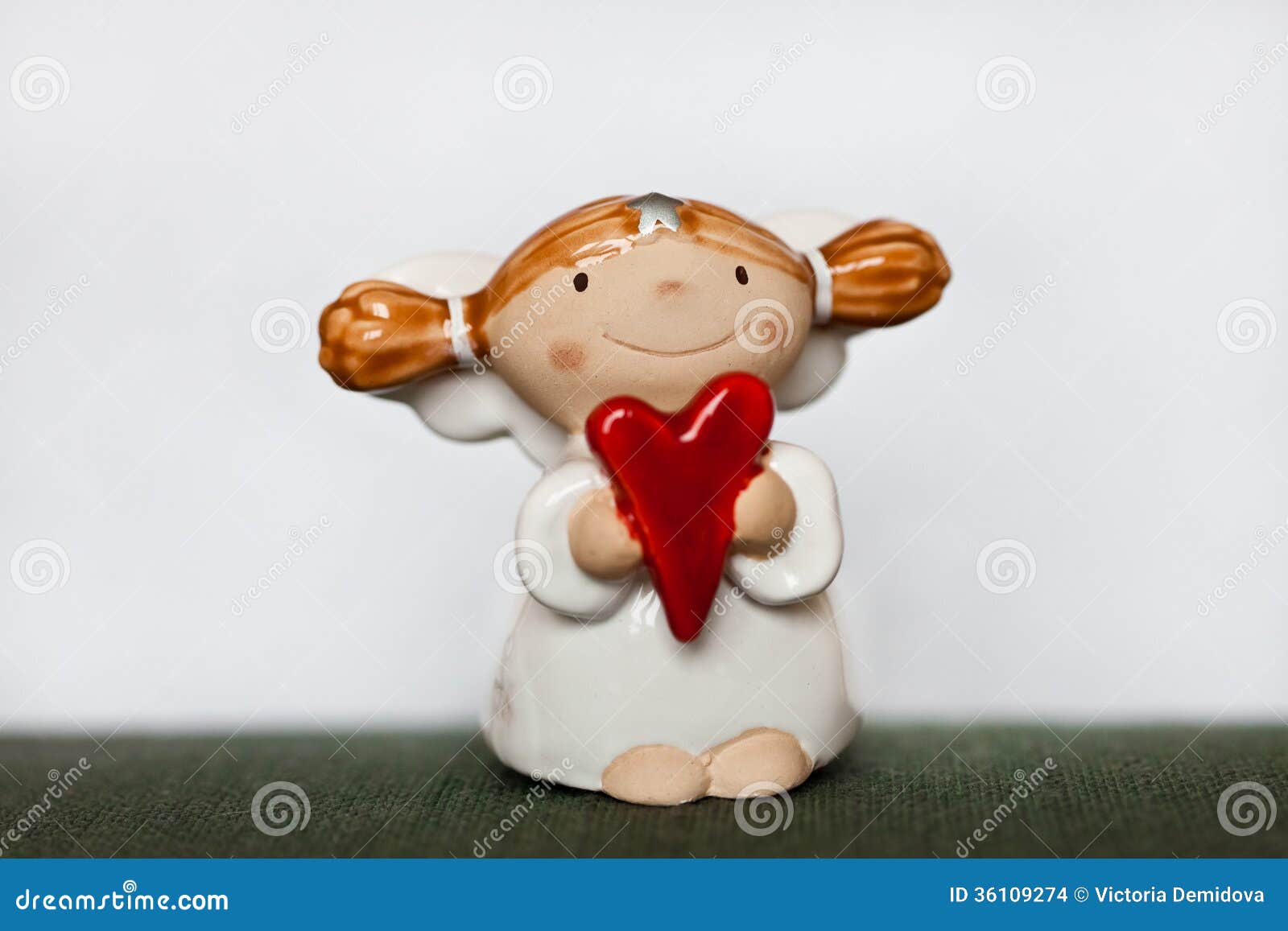 Angel with heart stock photo. Image of smile, doll, heart - 36109274
