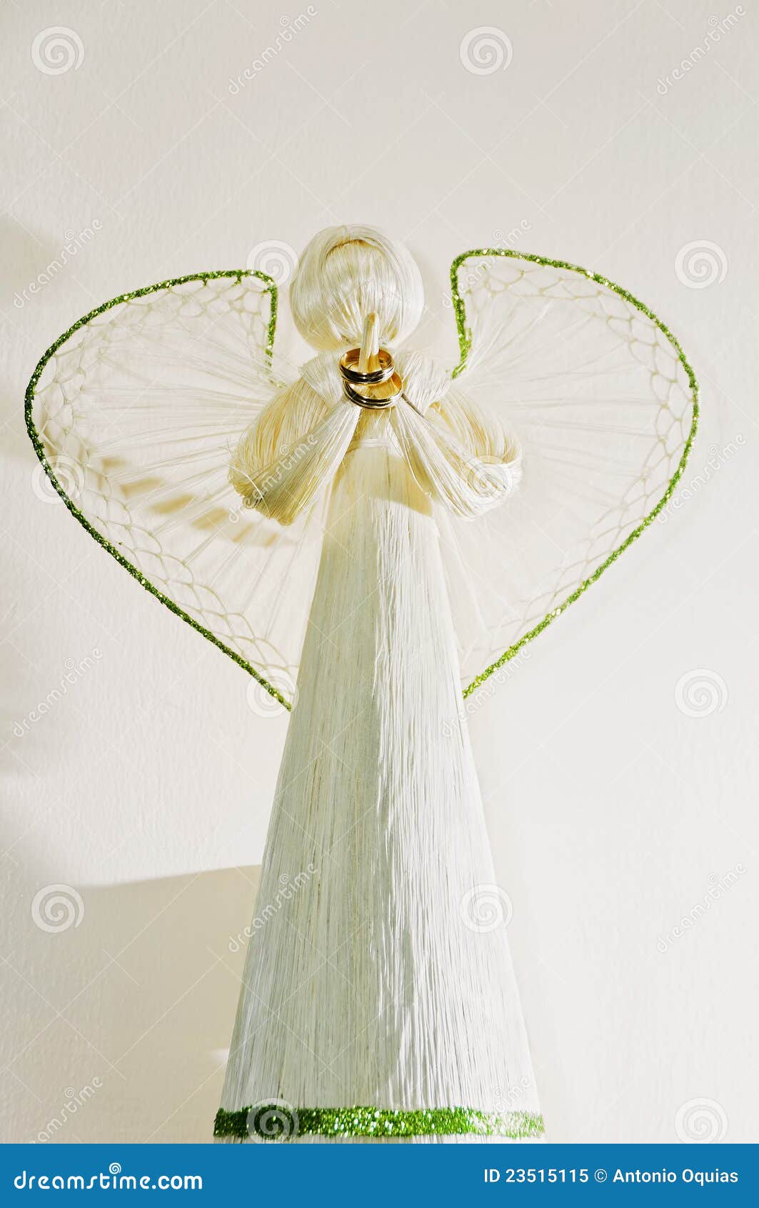 Angel Holding Wedding Ring stock image. Image of hands - 23515115