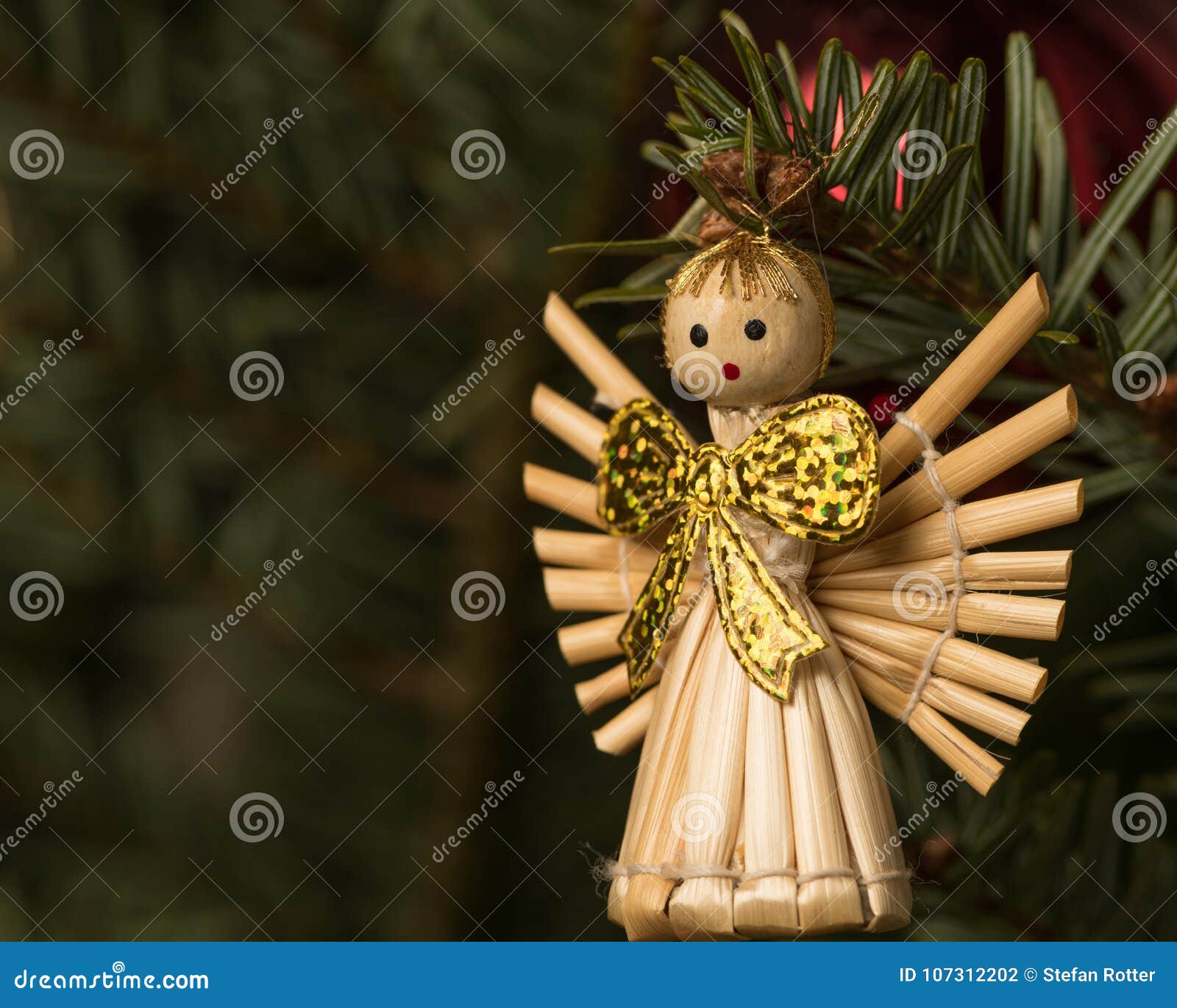 An Angel Made of Straw Hanging on a Christmas Tree Stock Photo - Image ...