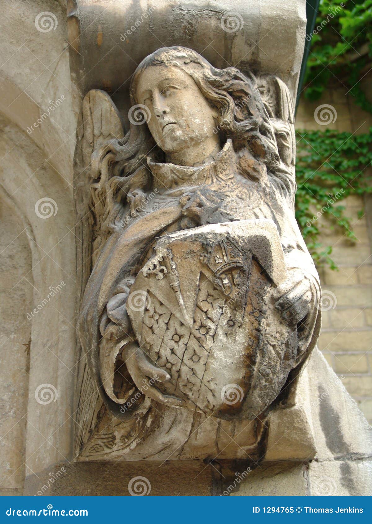 Angel with Shield on Door Archway Stock Image - Image of guardian ...