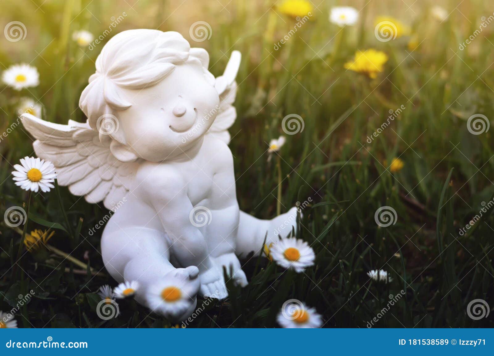 Angel sitting on the grass stock image. Image of sitting - 181538589