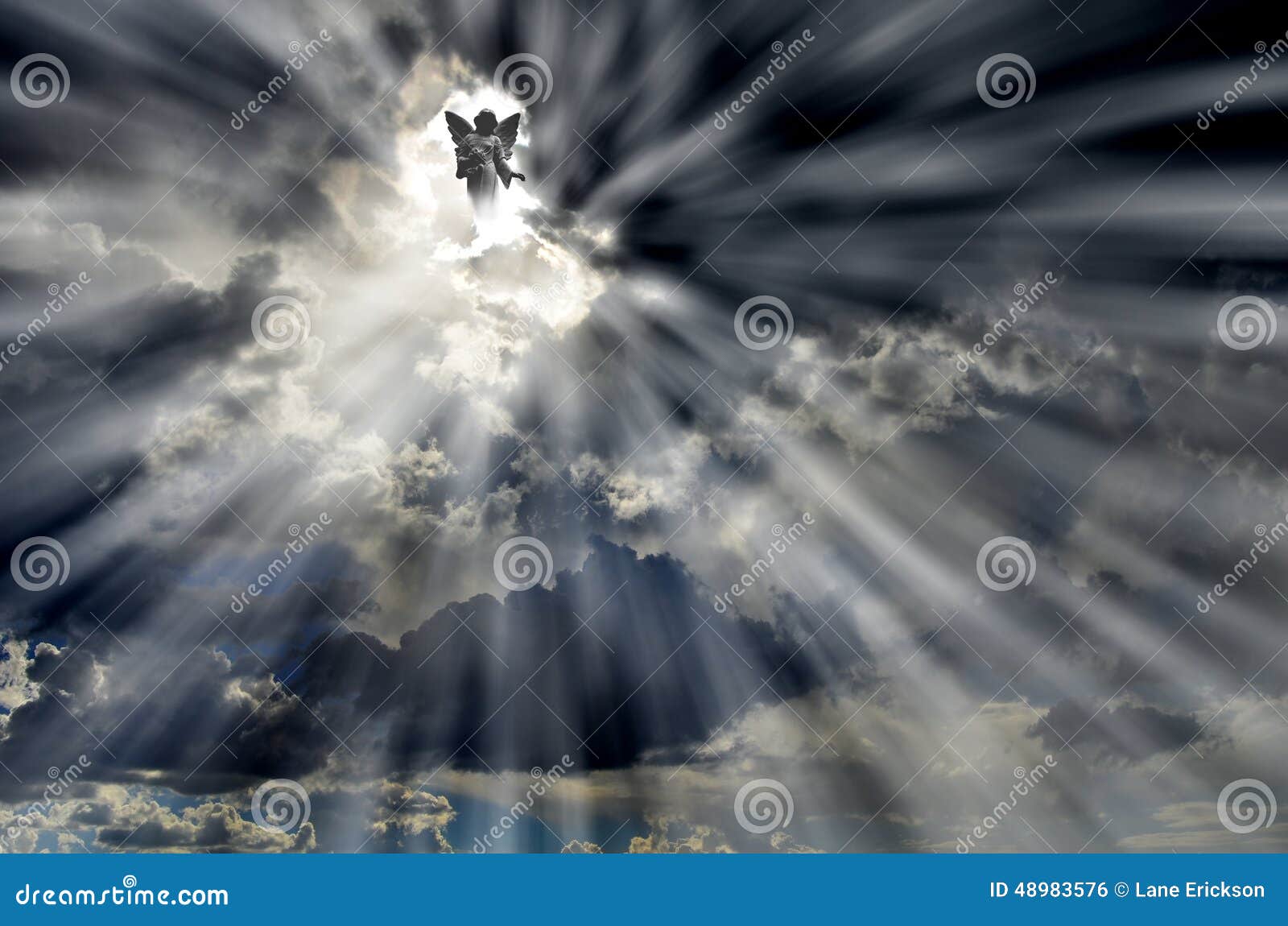 Angel In Sky Clouds With Rays Of Light Stock Photo - Image: 48983576