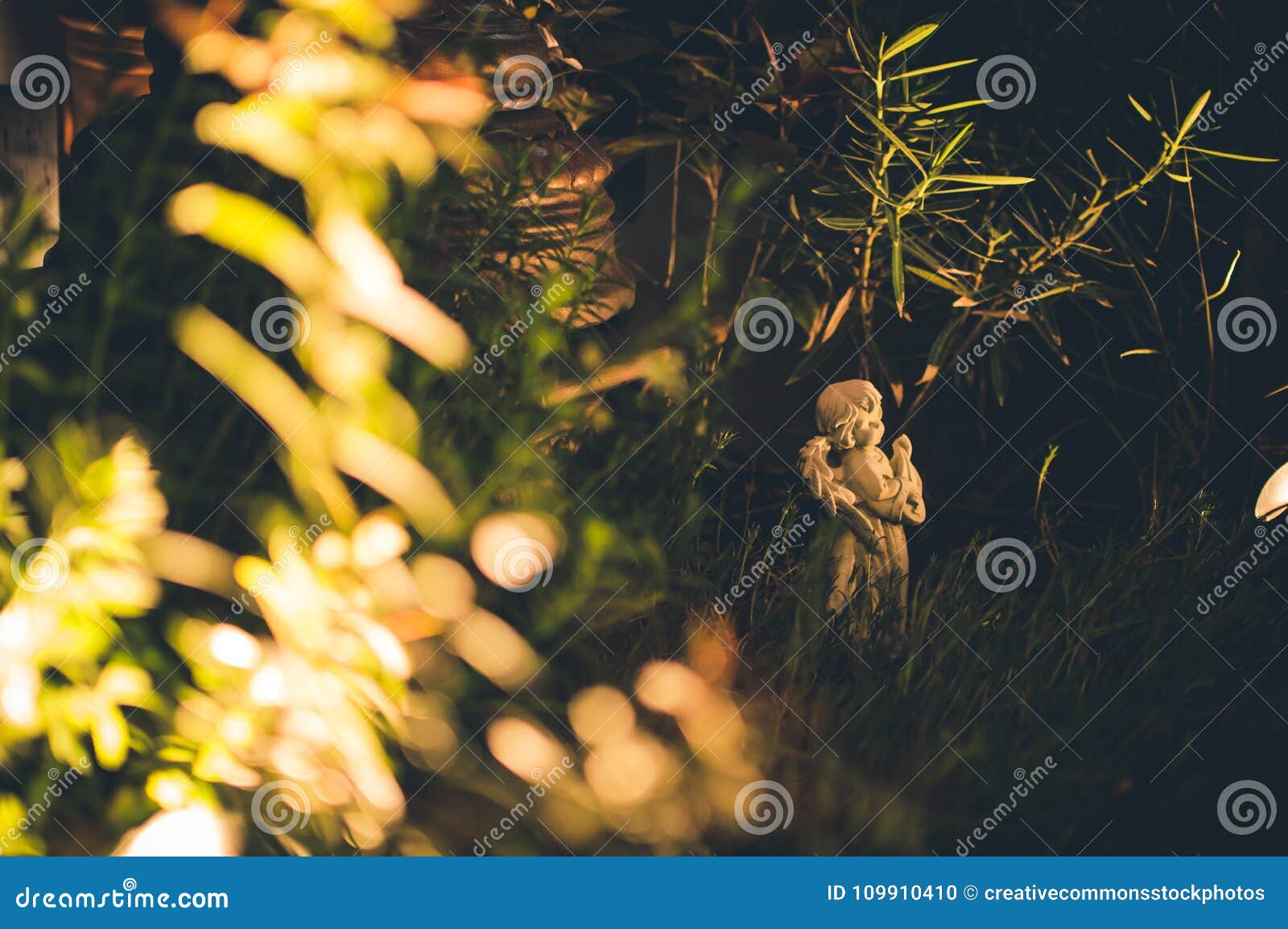 Angel Statue In The Grass Picture. Image: 109910410