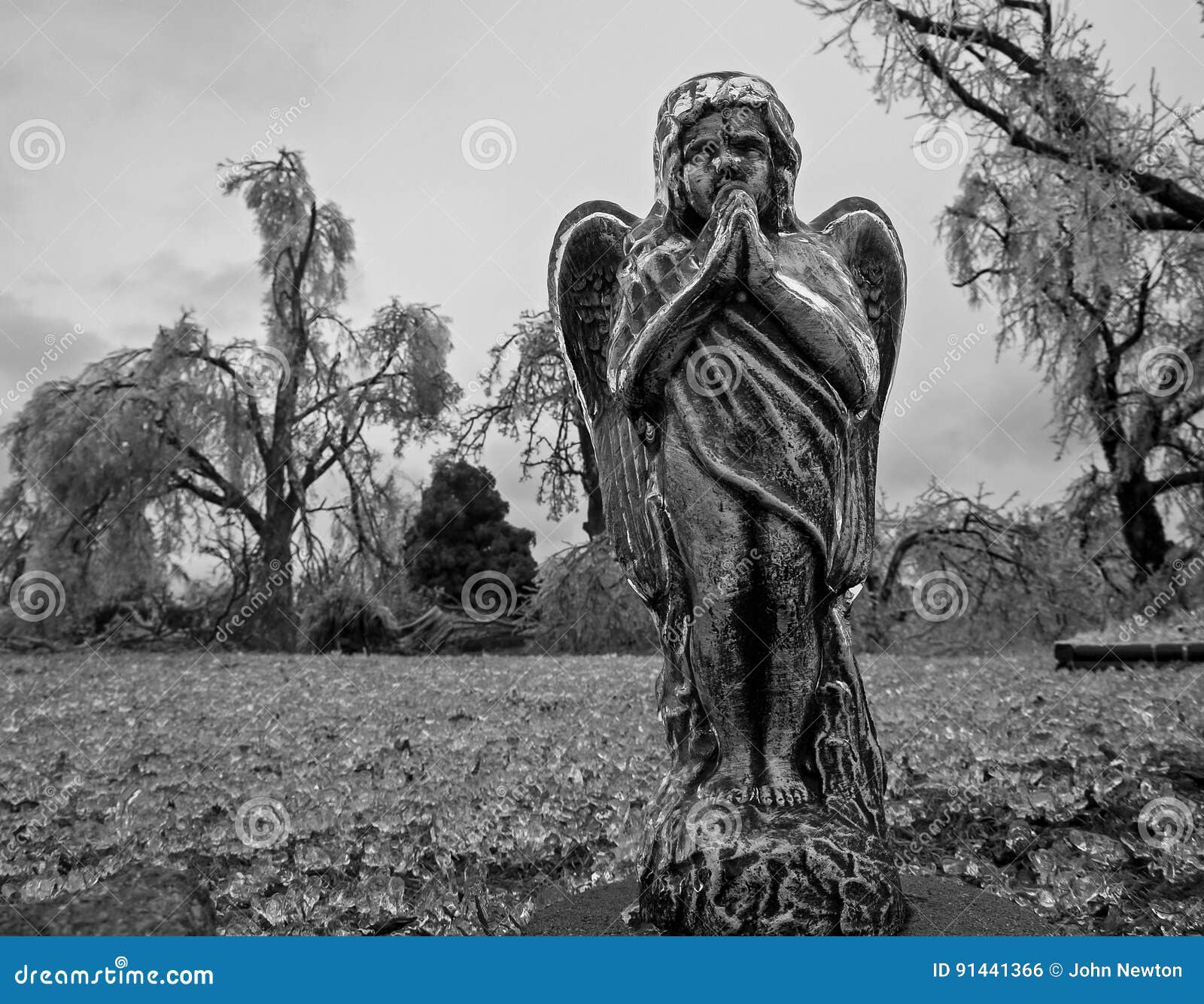 Angel Statue after an Ice Storm Stock Photo - Image of empty, falling ...