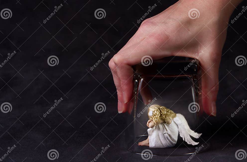 An Angel Trapped Under a Glass Stock Photo - Image of magic, nature ...
