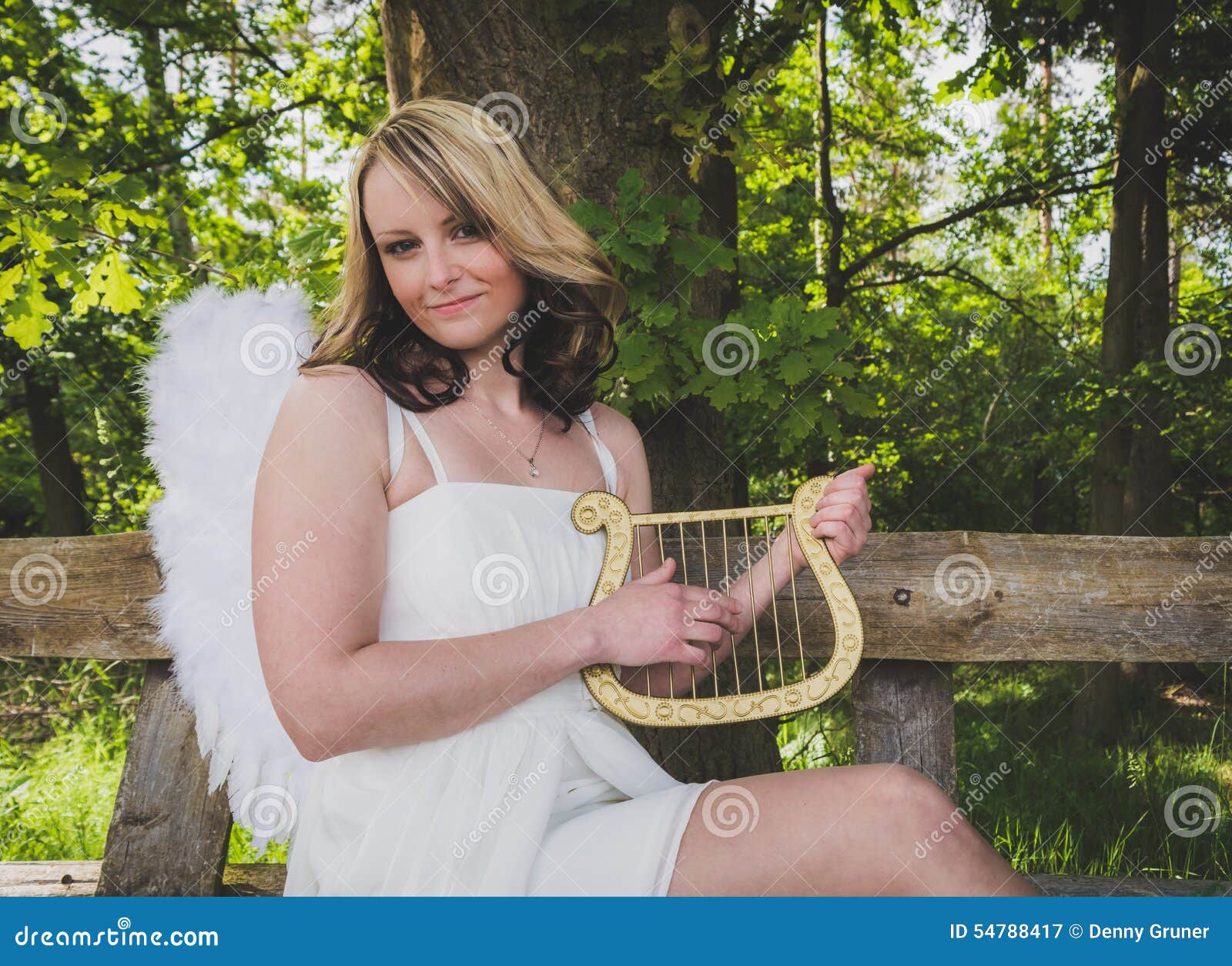 Angel woman with harp stock image. Image of person, religious - 54788417