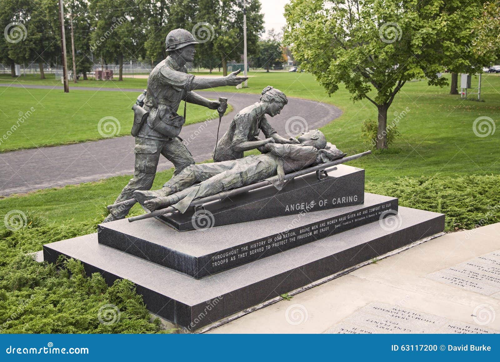 Angels of caring statue stock photo. Image of trees, historic - 63117200