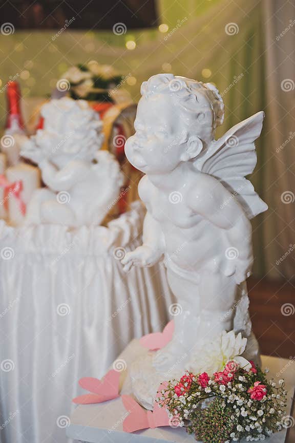 Figures of Angels on the Table among the Flowers 7791. Stock Photo ...