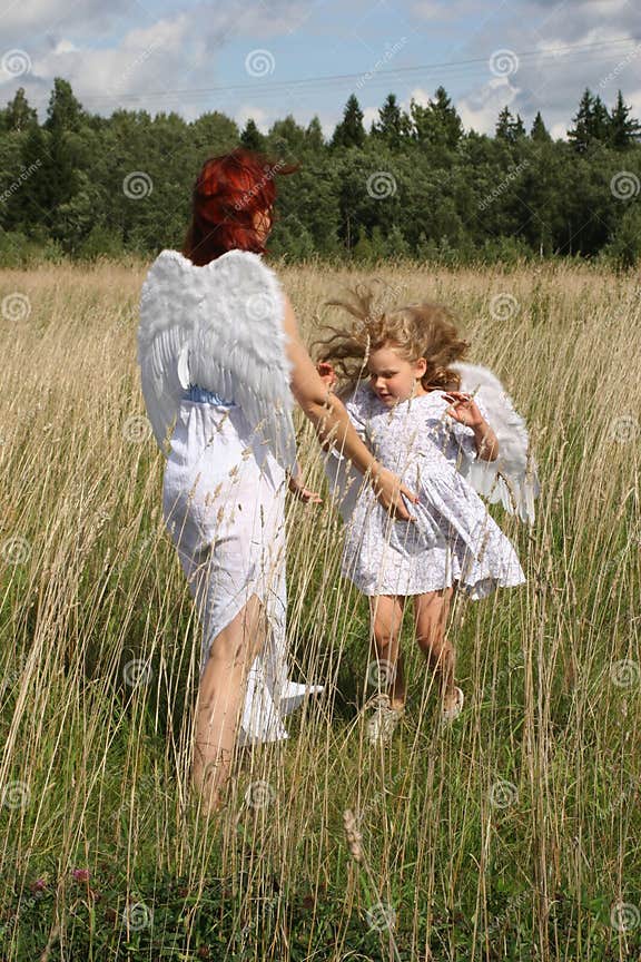 Angels mother and child stock image. Image of angel, faith - 2112893