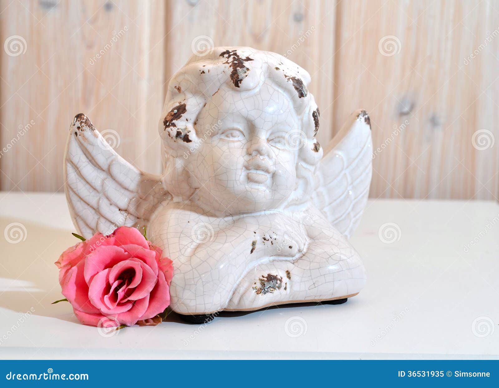 Angels and pink rose stock image. Image of bretterwand - 36531935