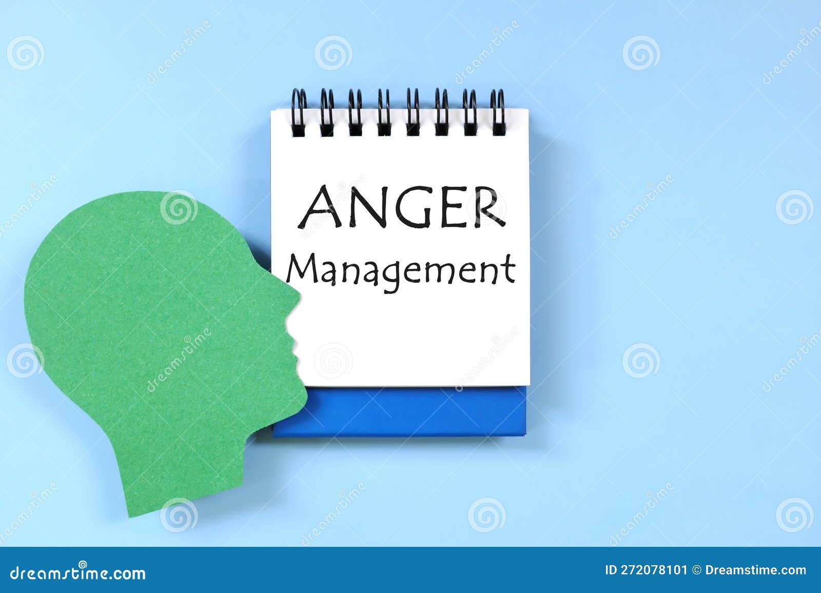 Anger Management Concept. Human Head Profile beside a Notepad with ...