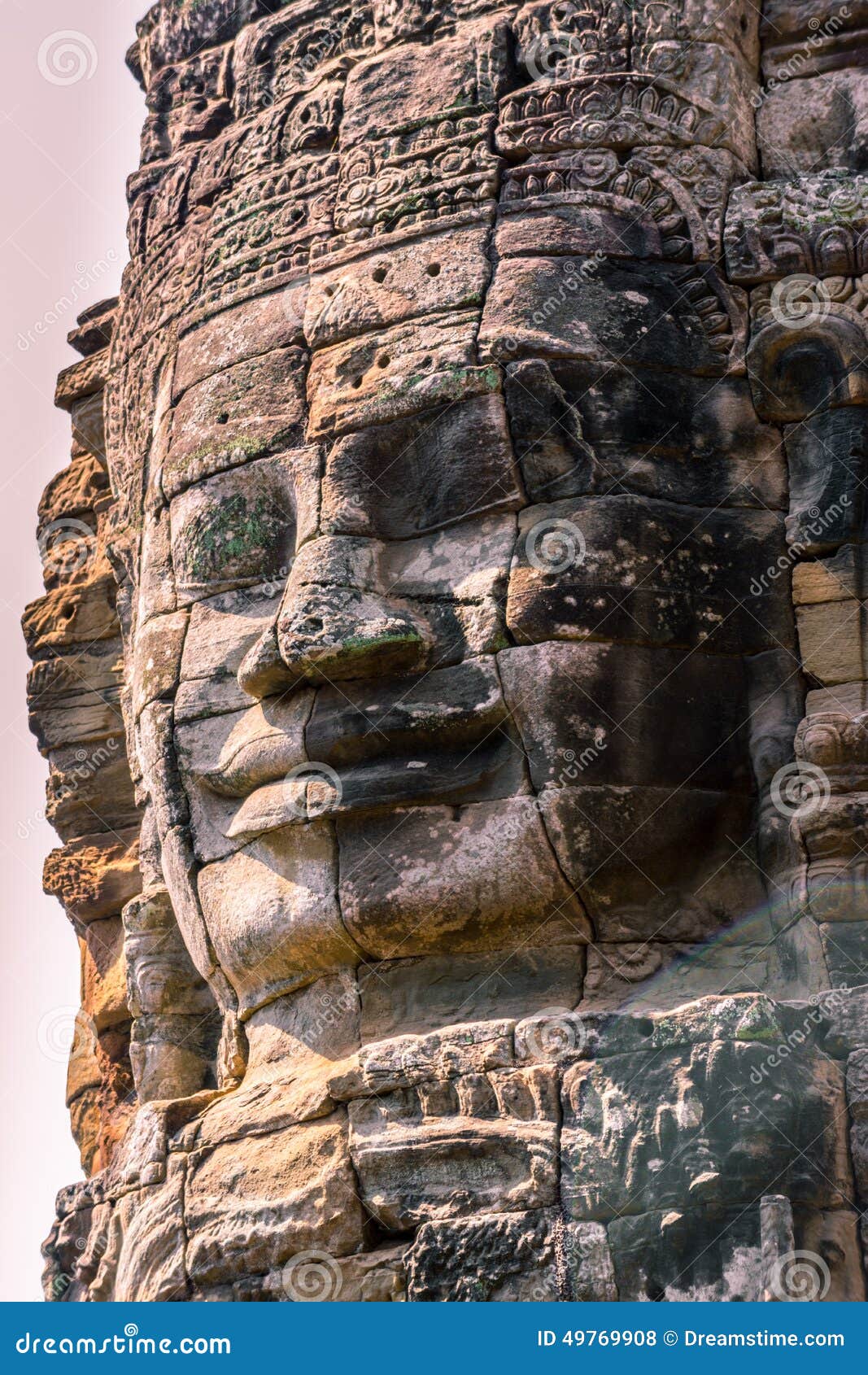 Angkor Face stock photo. Image of ancient, stone, statue - 49769908