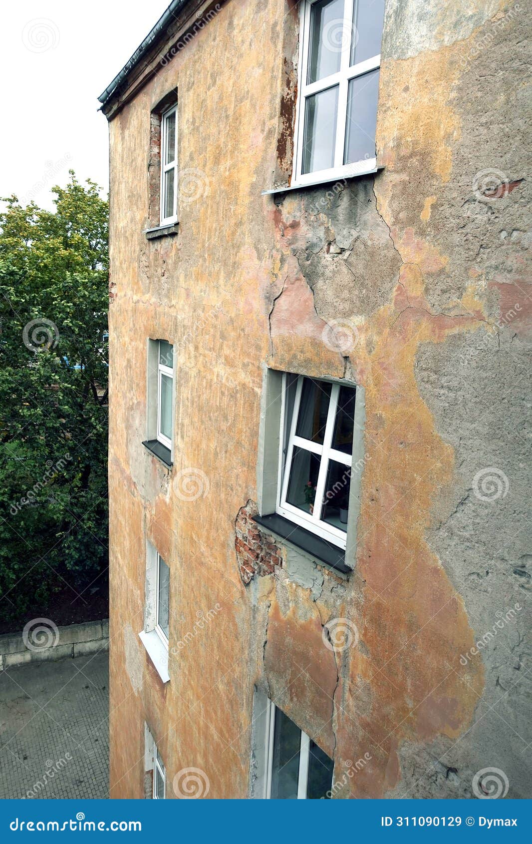 Angle Buildimg Wall in Bad Condition with New Plastic Windows Side View ...