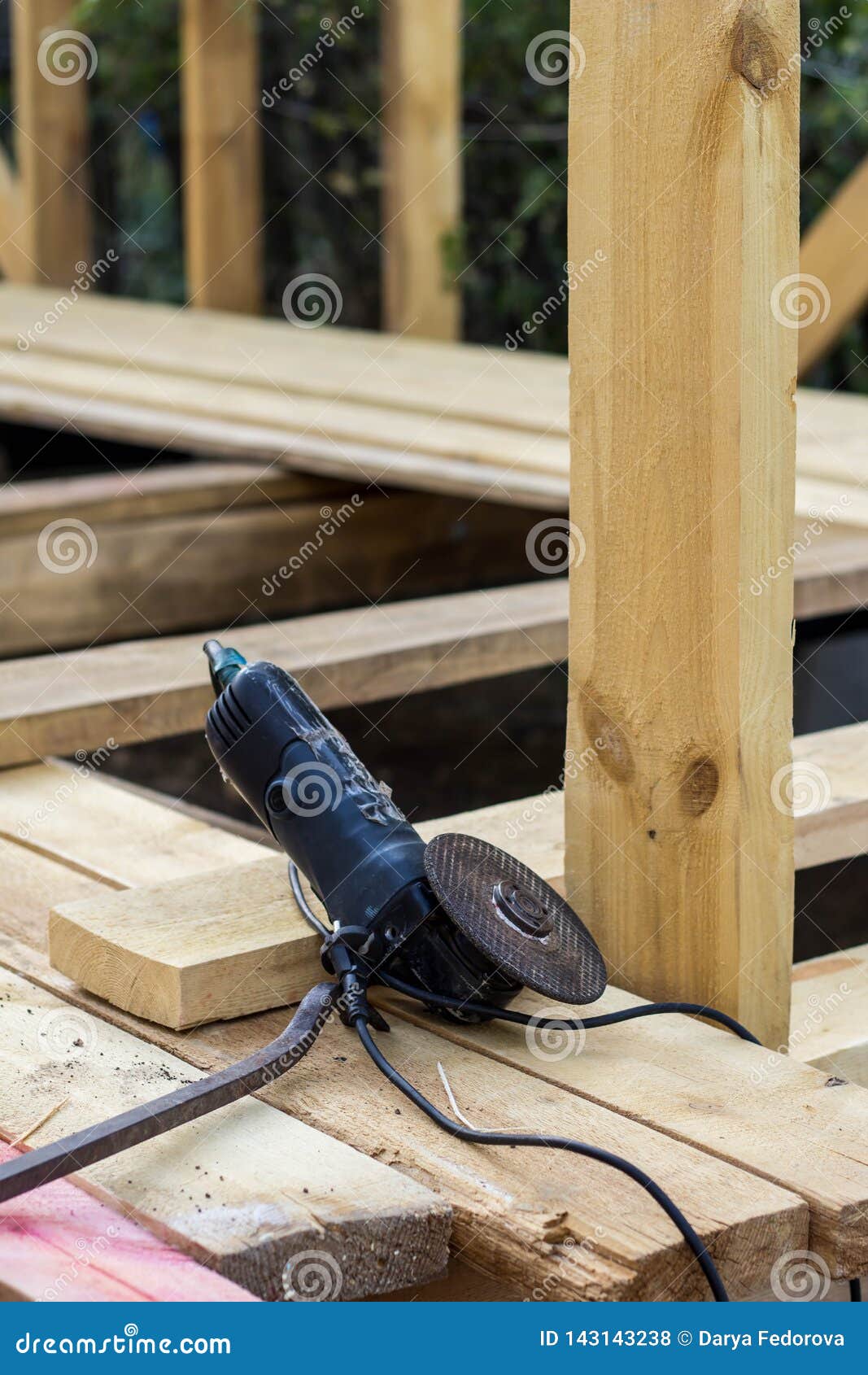 Angle Grinder Is On The Background Of Construction Stock Photo - Image ...