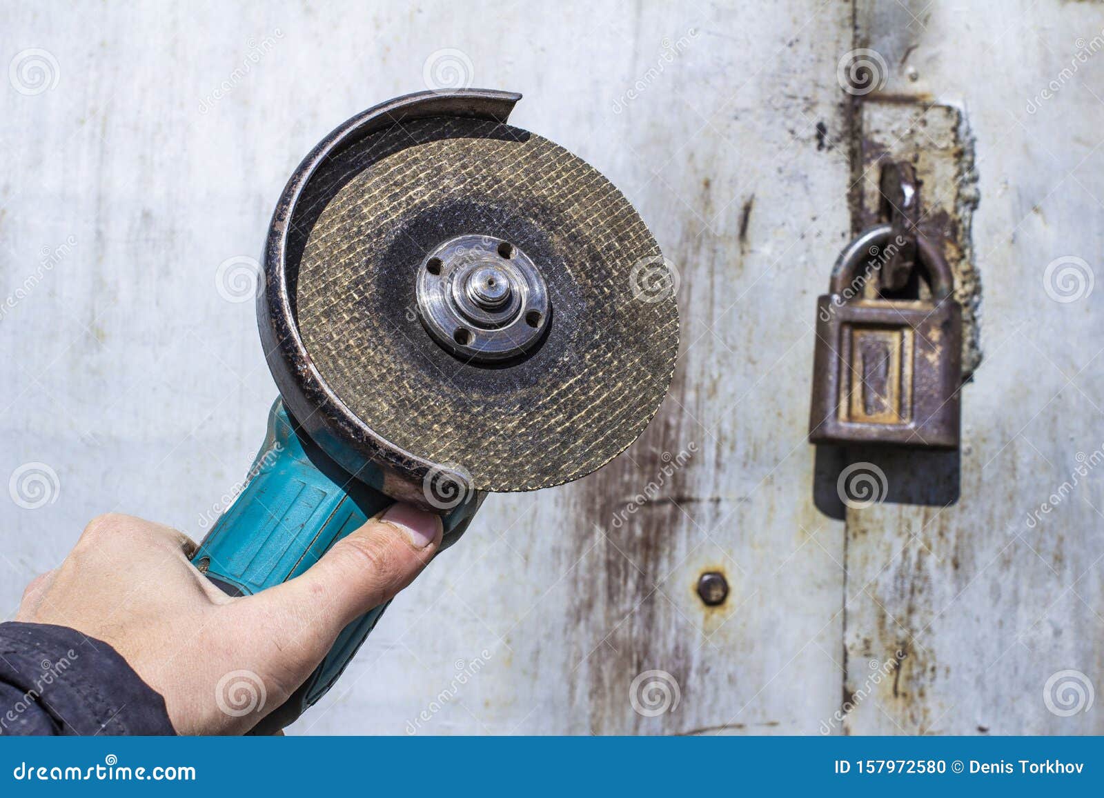 Angle Grinder on a Blurred Background Padlock Stock Photo - Image of ...