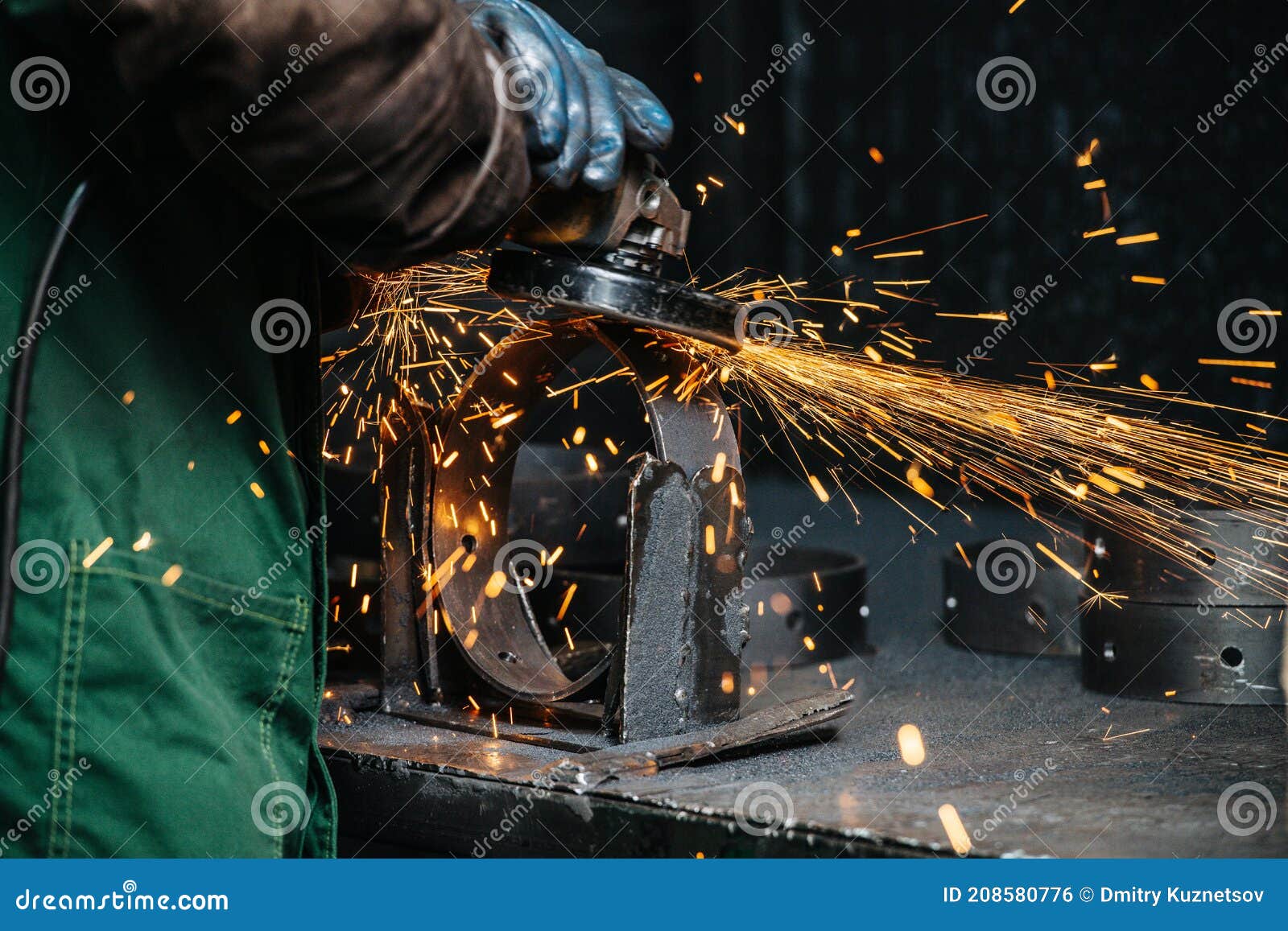 Angle Grinder at Work, Yellow Tracks from Sparks Flying Away in the ...