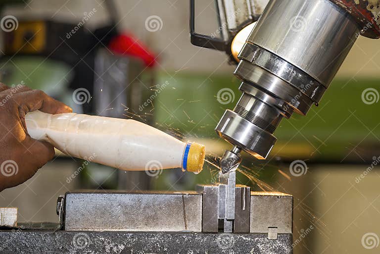 The Angle Milling Process on NC Milling Machine with Liquid Coolant ...