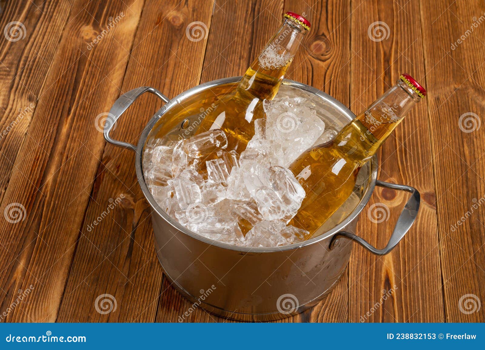 Bottles of Beer in a Still Bucket with Ice Stock Image - Image of ...