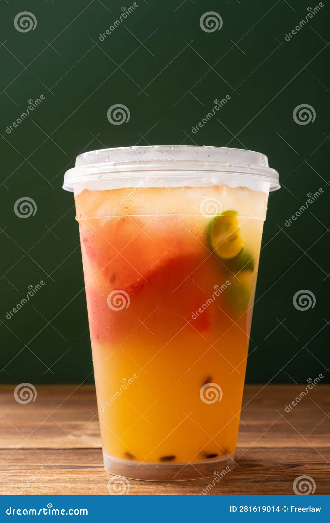 Cup of Iced Fruit Drink at Vertical Composition Stock Photo - Image of ...