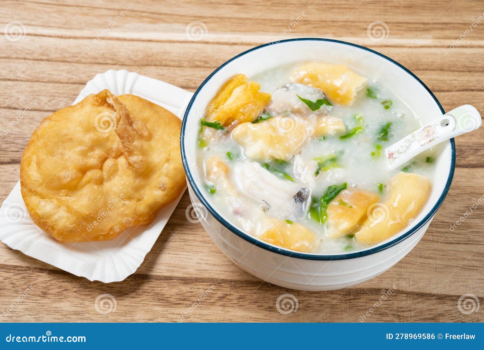 Fish Porridge with Deep-fried Chinese Donuts at Horizontal Composition ...