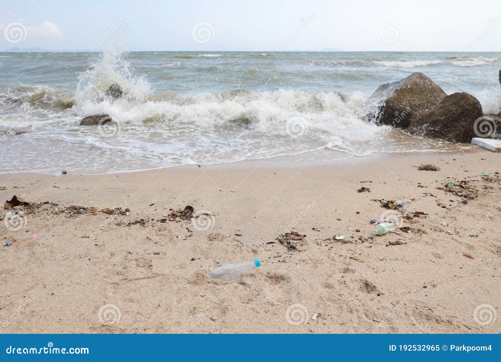 Angle View Image of Empty Plastic Water Bottle on Dirty Beach Filled ...
