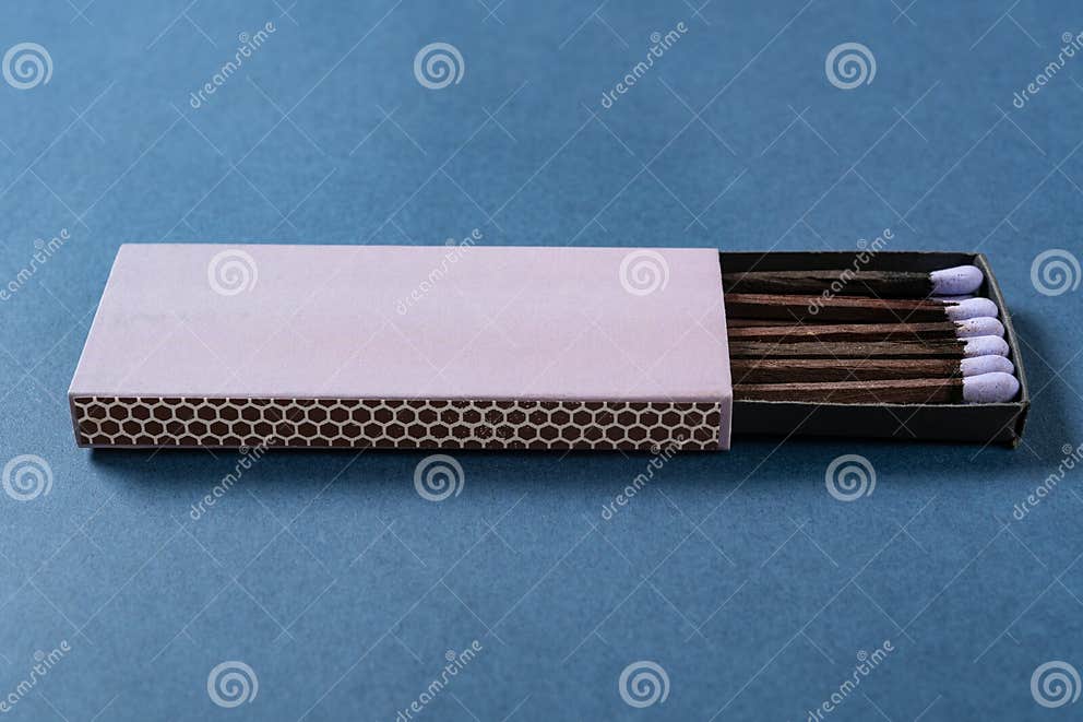 Angle View Lilac Matchbox on a Blue Background Horizontal Composition ...