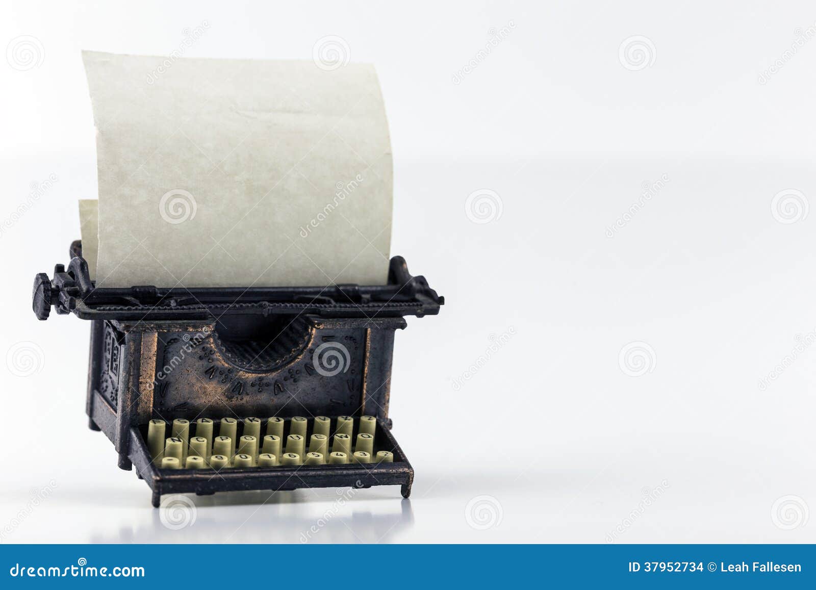 Angled Bronze Typewriter stock photo. Image of paper - 37952734