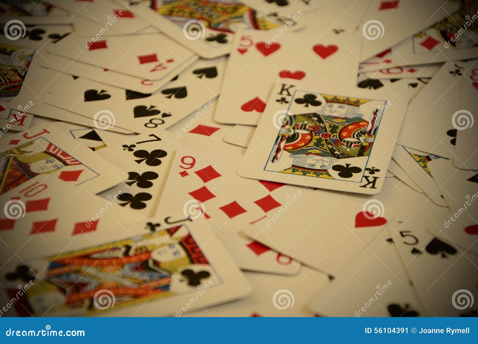 Angled View of Playing Cards Scattered on a Table Stock Image - Image ...
