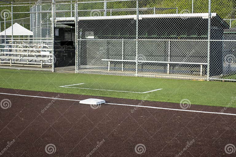 Angled View of a White Base on a Baseball Field, with the View of a ...
