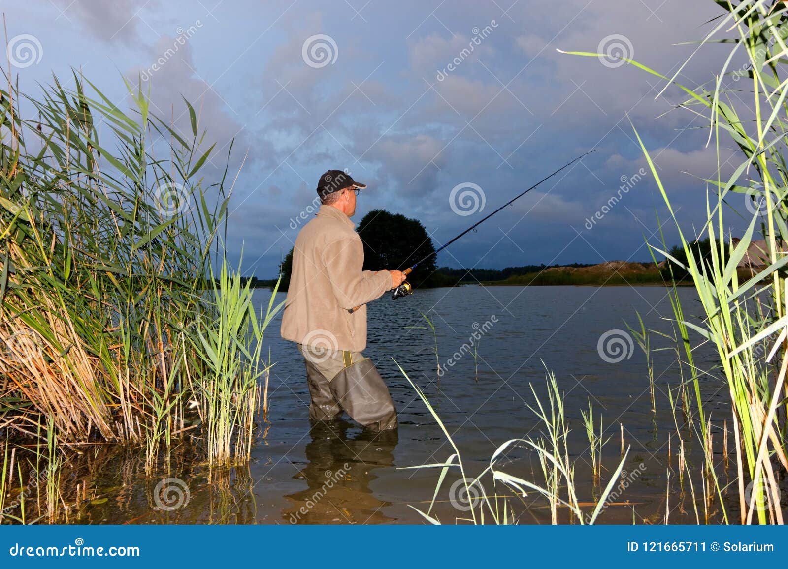 Angler stock image. Image of clouds, fisherman, cloudy - 121665711