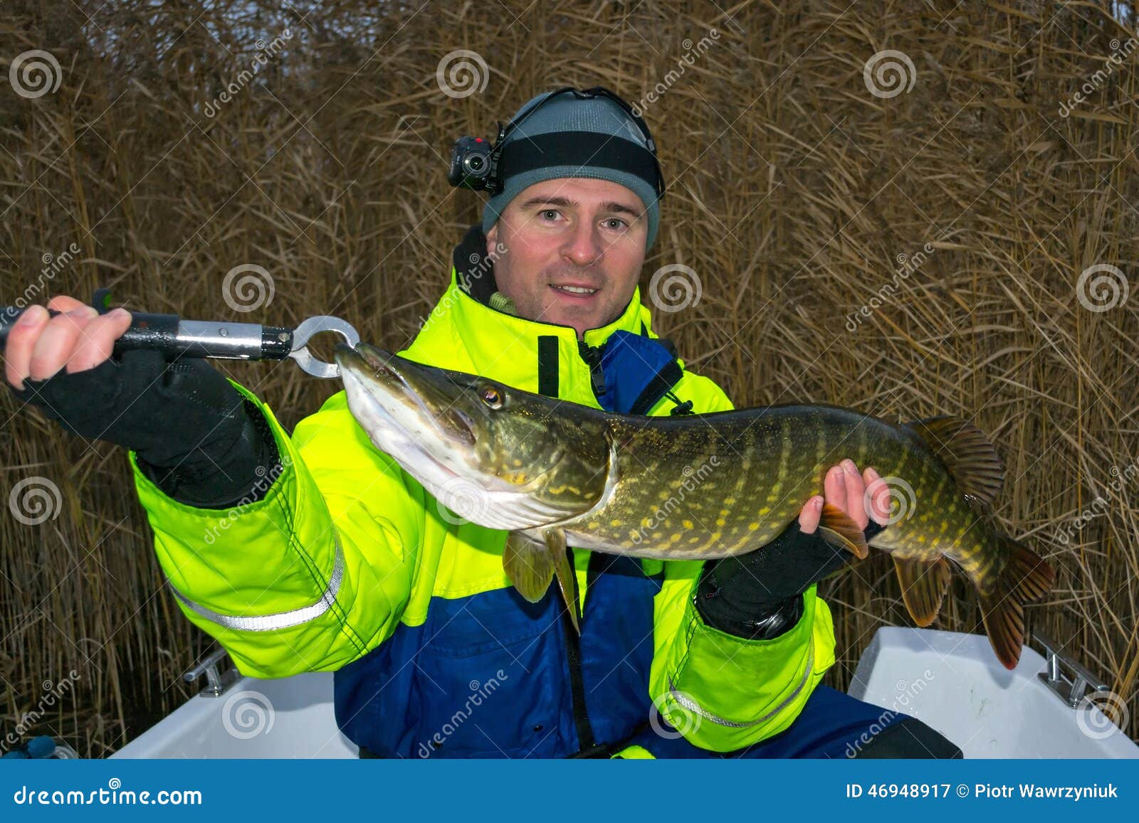 Angler with Autumn Pike Trophy Stock Image - Image of jigg, boat: 46948917