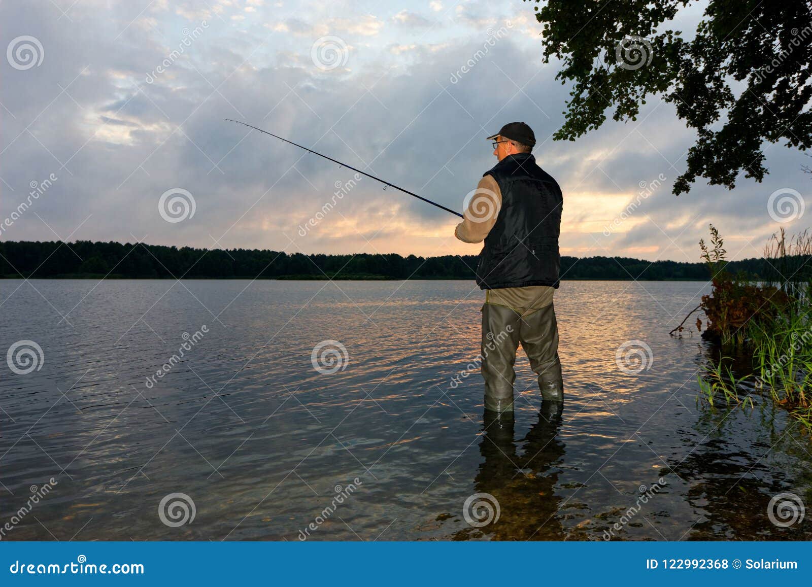 Angler stock photo. Image of sunrise, catching, alone - 122992368