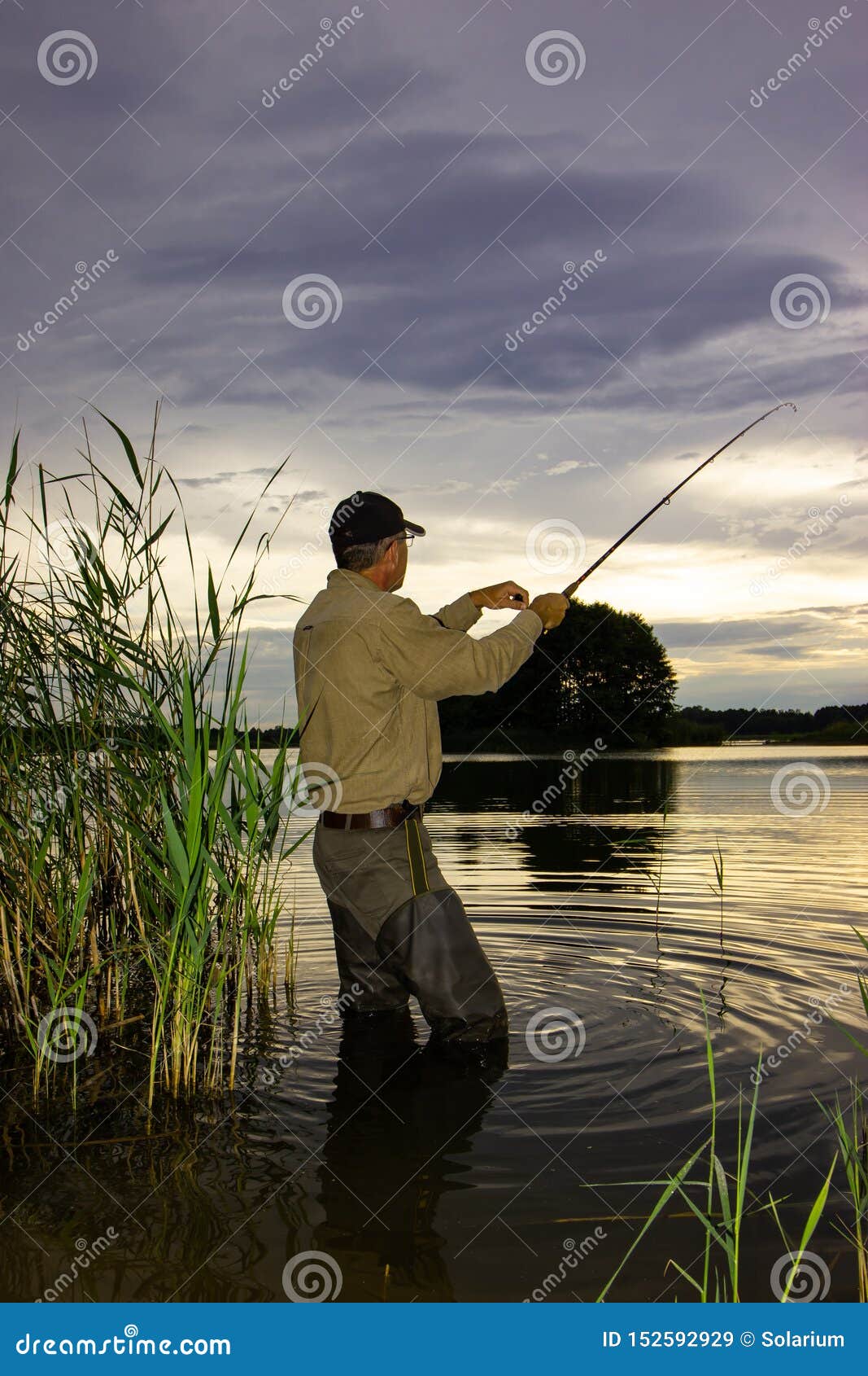 Angler stock image. Image of clouds, fisherman, freshwater - 152592929